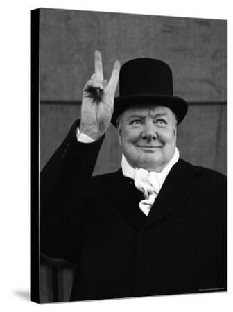 'British Pm Winston Churchill Sporting Top Hat with Coat and Scarf as ...
