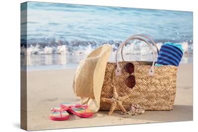 'Summer Beach Bag with Straw Hat,Towel,Sunglasses and Flip Flops on ...