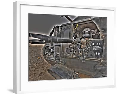 'A UH-60 Black Hawk Door Gunner Manning a M240G Medium Machine Gun ...