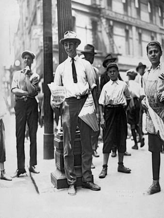 A Young Man Selling Newspapers on the Street Corner, Atlanta, Georgia ...