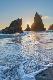 'Sun setting behind Split Rock on Rialto Beach Olympic National Park ...