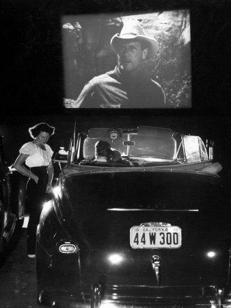 'Female Car-Hop Taking Order from Couple in Convertible Car During ...