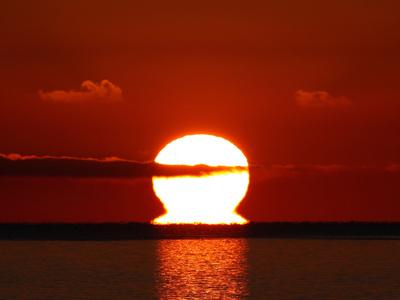 'An Omega-shaped Sunrise Above the Water in Buenos Aires, Argentina ...