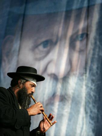 'An Ultra-Orthodox Jewish Man Plays a Flute' Photographic Print | Art.com