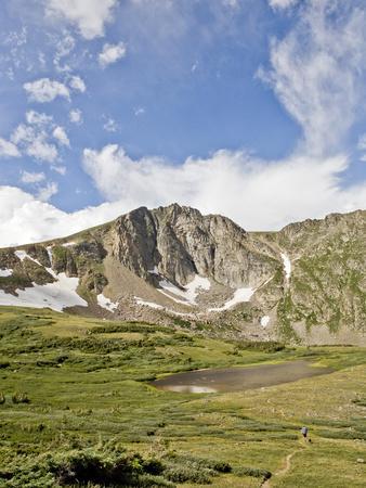 'A Lone Backpacker Descends the Trail to Devil's Thumb Lake in the ...