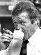 'Roger Moore Drinking Coffee' Photo - Associated Newspapers | Art.com