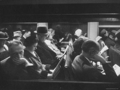 'Commuters Reading on the Train' Photographic Print - Walter Sanders ...