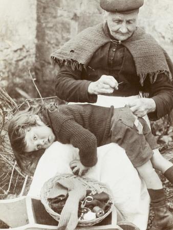 'Cornish Grandmother Repairs Her Grandson's Clothing' Photographic ...
