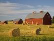 'Barns and Hay Bales in Field' Photographic Print - Darrell Gulin | Art.com