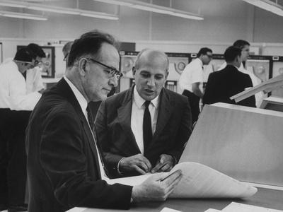'Dr. John Mauchly and Sperry Rand VP J. Presper Eckert Examining Data ...