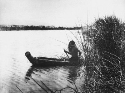 'Pomo Indian Poling His Boat Made of Tule Rushes Through Shallows of ...
