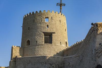 Middle East, Arabian Peninsula, Oman, Muscat, Muttrah. A tower at ...