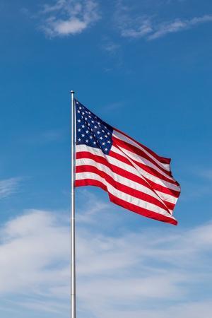 'USA, Washington State, Palouse. Pullman. USA Flag, blowing in breeze ...