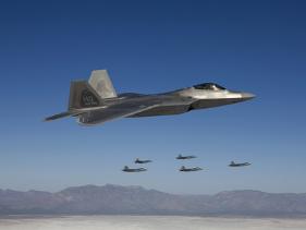 'F-22 Raptors Fly in Formation During a Training Mission Over New ...