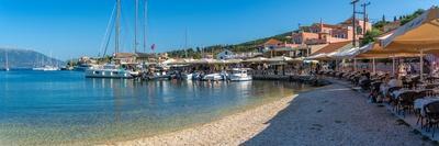 'View of cafes and restaurants in Fiscardo harbour, Fiscardo, Kefalonia ...