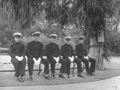 'Funeral Attendants Sitting on Bench at Forest Lawn Cemetery ...