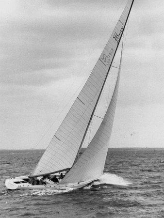 'The Two Sail Sailboat Vigorously Gliding Through the Water During the ...