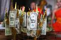 'US dollars on Buddhist money tree to make merit and donate to local ...
