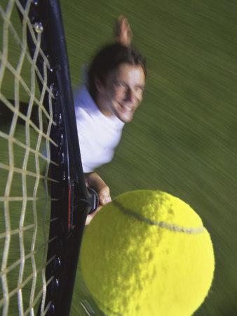 'High Angle View of a Man Hitting a Tennis Ball' Photographic Print ...