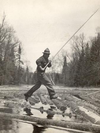 Log Driver Leaping Across Floating Logs to Keep Them Moving by Breaking ...