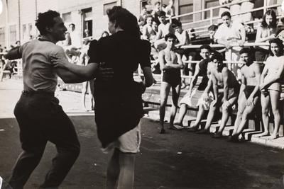 dancers with onlookers in stands Photographic Print - Lucien Aigner ...