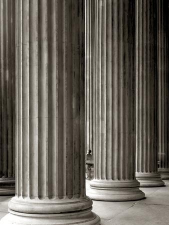 Man Walking through Columns at the British Museum, London (Photo ...
