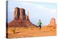 Runner. Running Man Sprinting in Monument Valley. Athlete Runner Cross ...