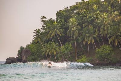 Surfer Surfing at Sunset at Mirissa Beach, South Coast, Sri Lanka ...