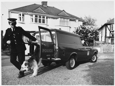 'Metropolitan Police Dog Handler Taking His Dog Out of a Police Van ...