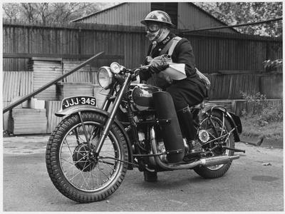 Metropolitan Police Officer on a Triumph Motorcycle During World War II ...