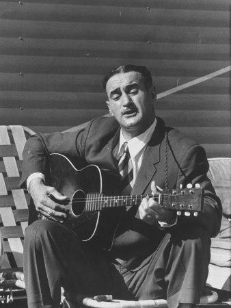 'Miner Maurice Ruddick Playing Guitar' Photographic Print - Carl Mydans ...