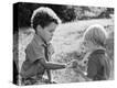 '1970s AFRICAN AMERICAN AND CAUCASIAN BOY PLAYING WITH BALSA WOOD TOY ...