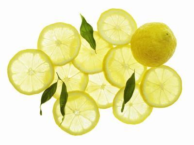'A Whole Lemon, Lemon Slices and Leaves' Photographic Print - Petr ...