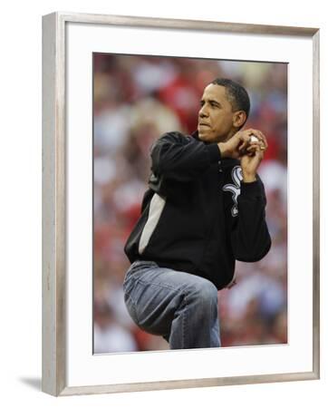 President Obama Winds Up to Throw Out the First Pitch During the MLB ...