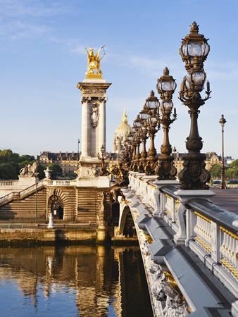 'Pont Alexandre-III and Dome des Invalides over Seine river ...