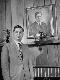 'Russell B. Long Standing Beneath a Portrait of His Father, Huey P ...