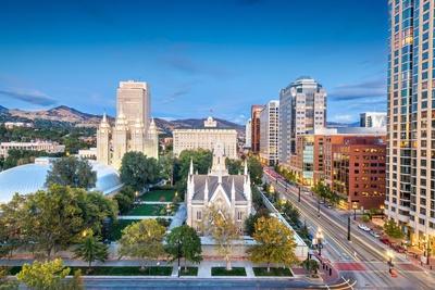 Salt Lake City, Utah, USA downtown cityscape over Temple Square at dusk ...