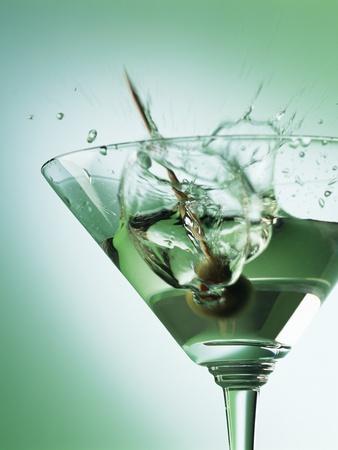 'Martini with Olive Splash' Photographic Print - Steve Lupton | Art.com