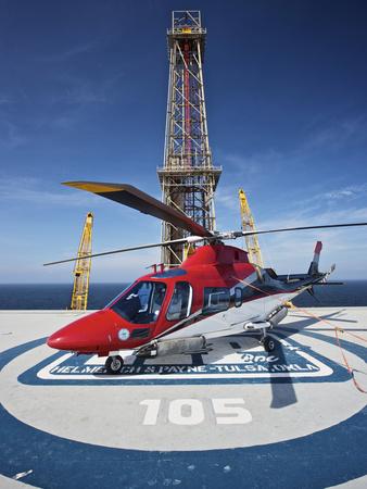 'AgustaWestland AW109E Utility Helicopter On the Helipad of An Oil Rig ...