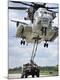 'U.S. Marines Conduct a Sling Load Operation with a CH-53E Super ...