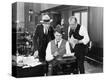 Three Men in an Office Hunched over a Typewriter Photo | Art.com