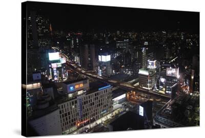 Neon Streets Stretched Canvas Print - Tony Koukos | Art.com