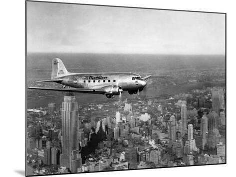 United Airlines Plane Flies over Manhattan, 1937 Photo by | Art.com