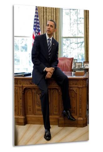 President Barack Obama Sits on the Edge of the Resolute Desk in the ...