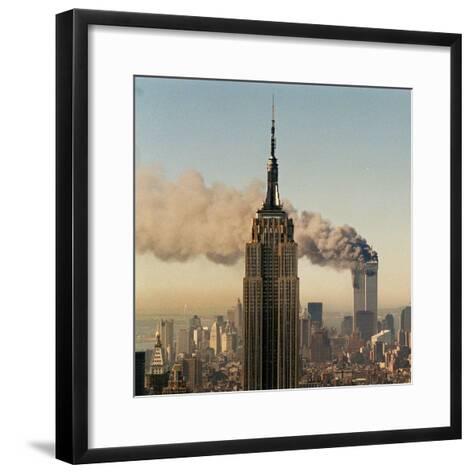 Twin Towers of the World Trade Center Burn Behind the Empire State ...