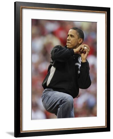 President Obama Winds Up to Throw Out the First Pitch During the MLB ...