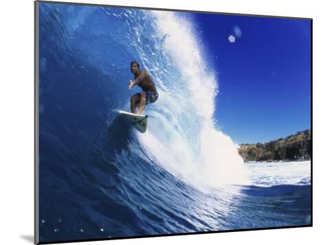 Wave Curling Up Over Surfer Photographic Print by | Art.com