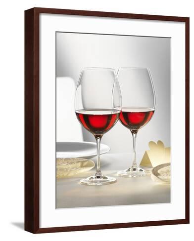 Two Glasses of Red Wine on Festive Table Photographic Print by ...