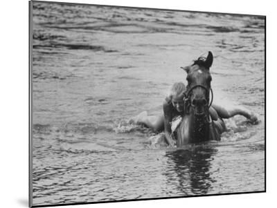 Sydney Hoyle Floundering on Back of Horse in Water at Full Cry Farm ...