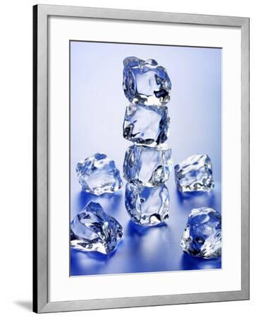Four Ice Cubes in a Pile, Individual Ice Cubes Beside Them Photographic ...